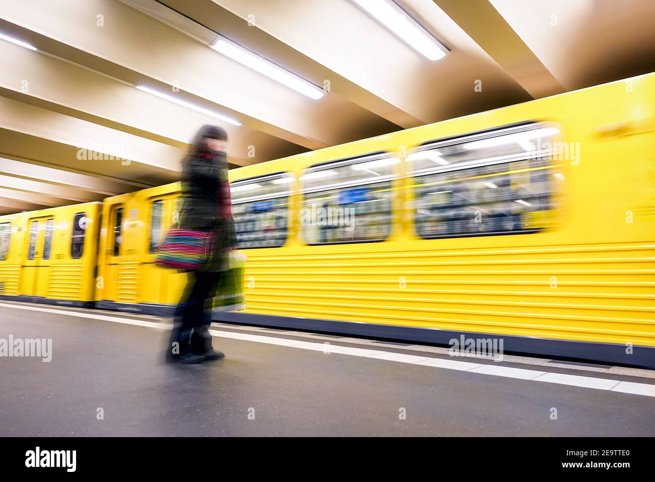 Woman alone subway station hi-res stock photography and images - Alamy