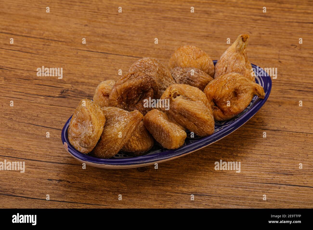 Dry sweet fig fruit heap snack Stock Photo - Alamy
