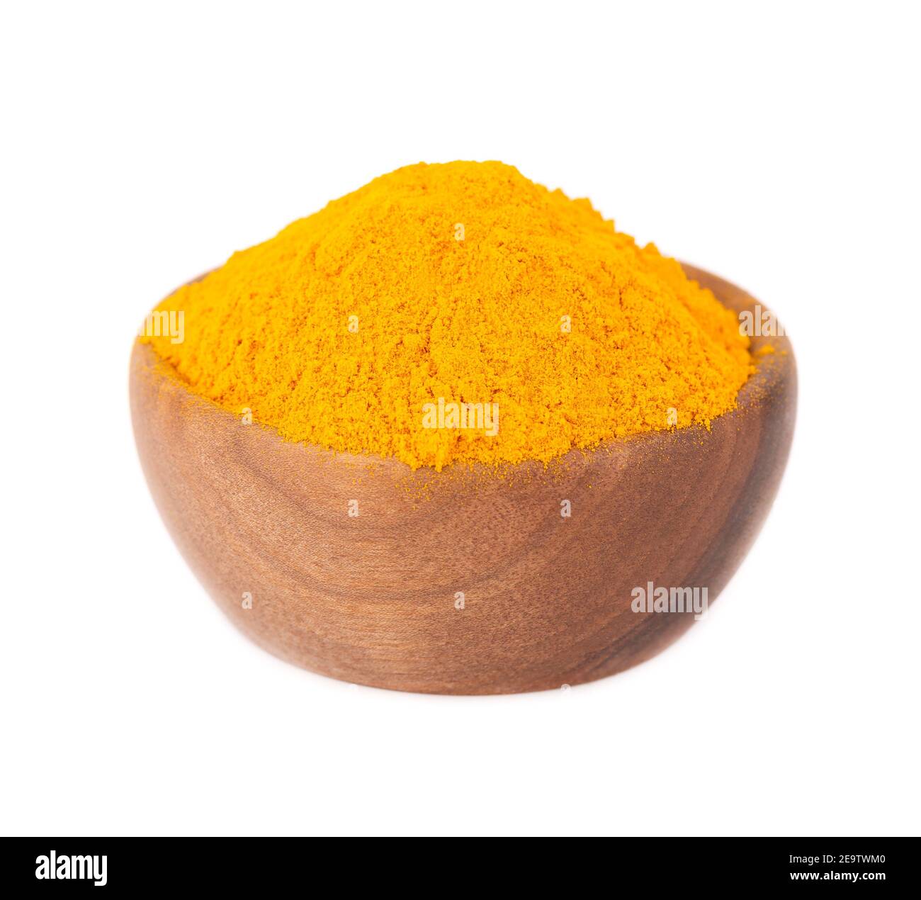 Dry turmeric powder in wooden bowl, isolated on white background ...