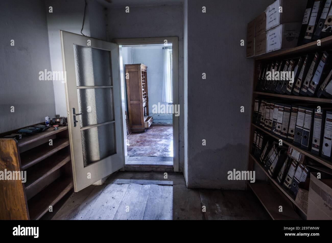 view into open abandoned old rooms Stock Photo - Alamy