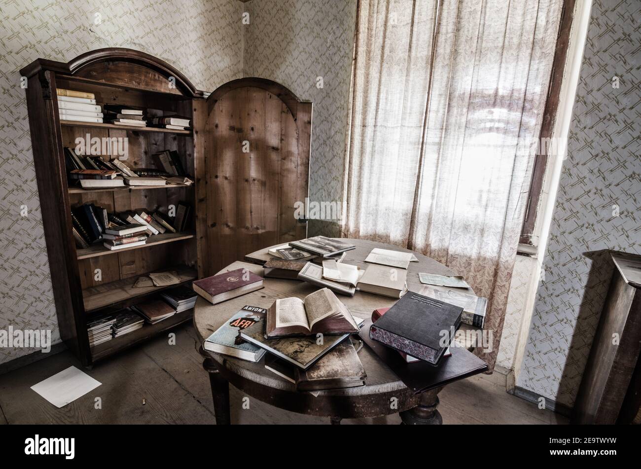 table and box with old books Stock Photo - Alamy