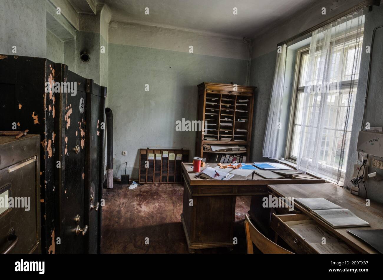 abandoned old office with furniture Stock Photo - Alamy