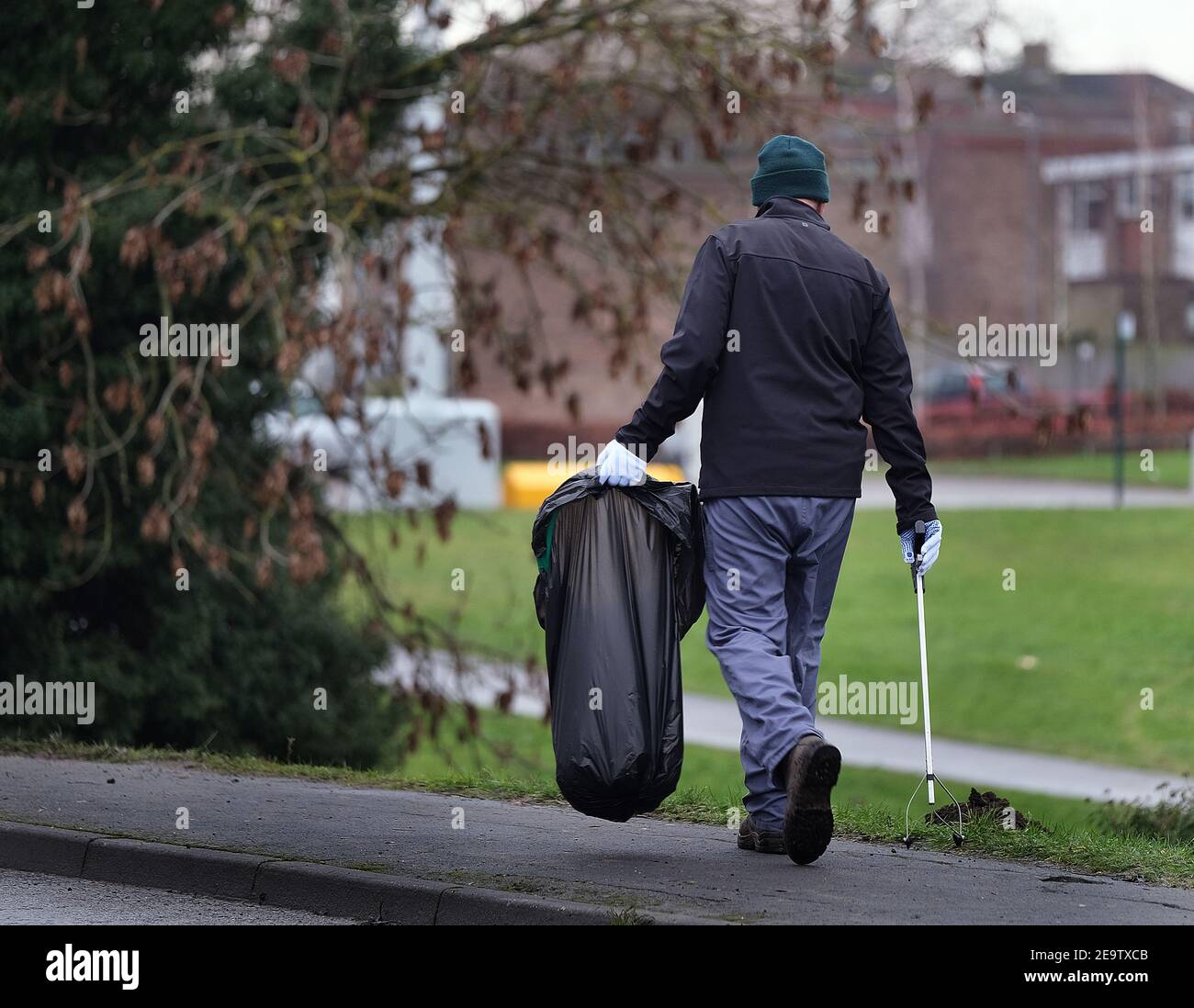 Garbage men clean up dirt hi-res stock photography and images - Alamy