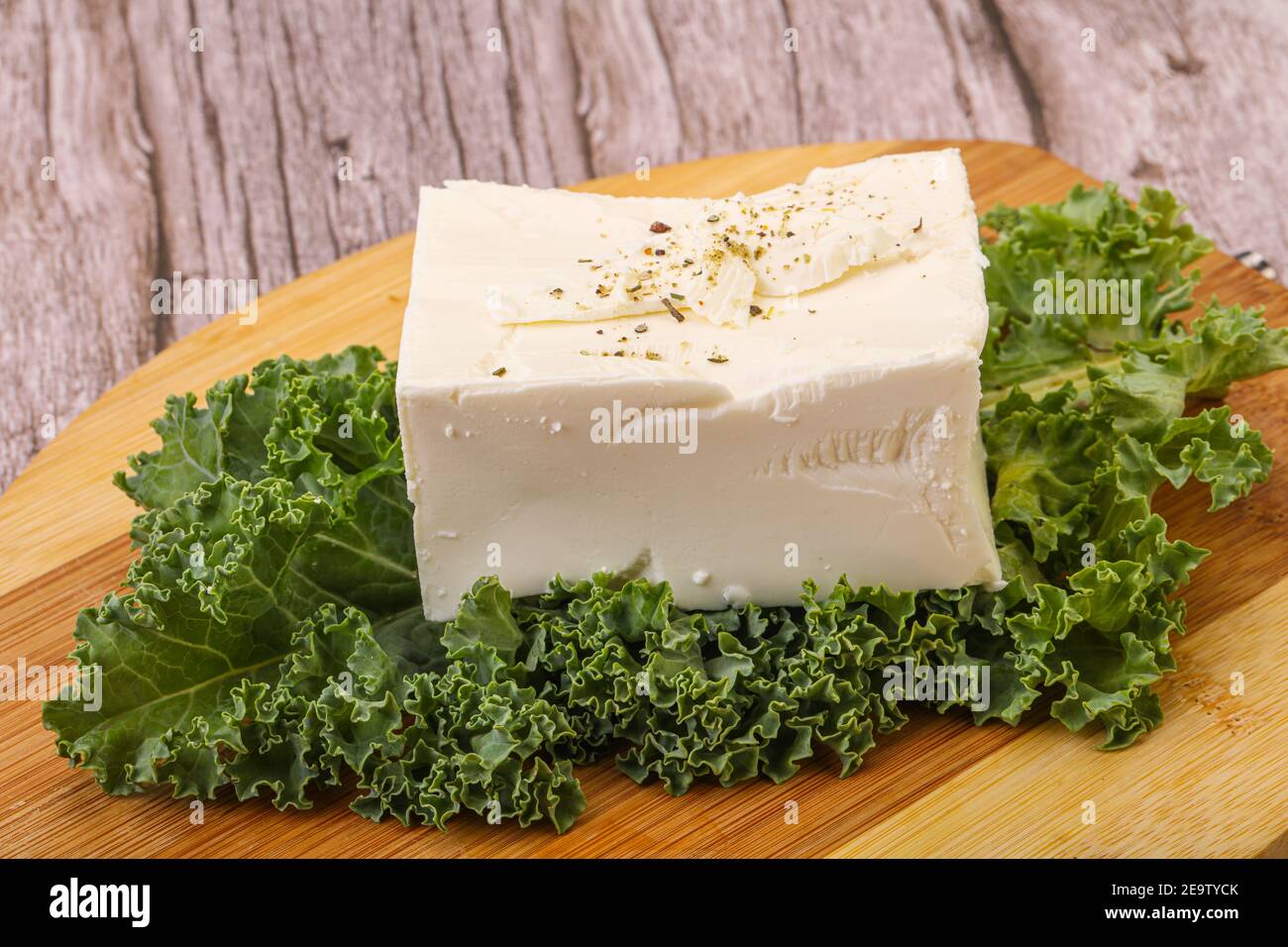 Traditional tasty Greek Feta soft cheese brick Stock Photo - Alamy