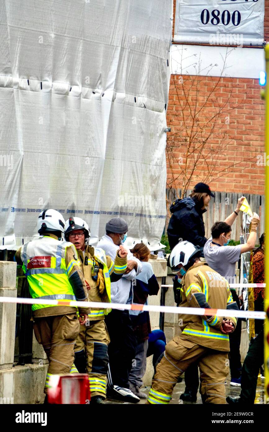 London Fire Brigade Monitoring Officer discussing fighting a house fire ...