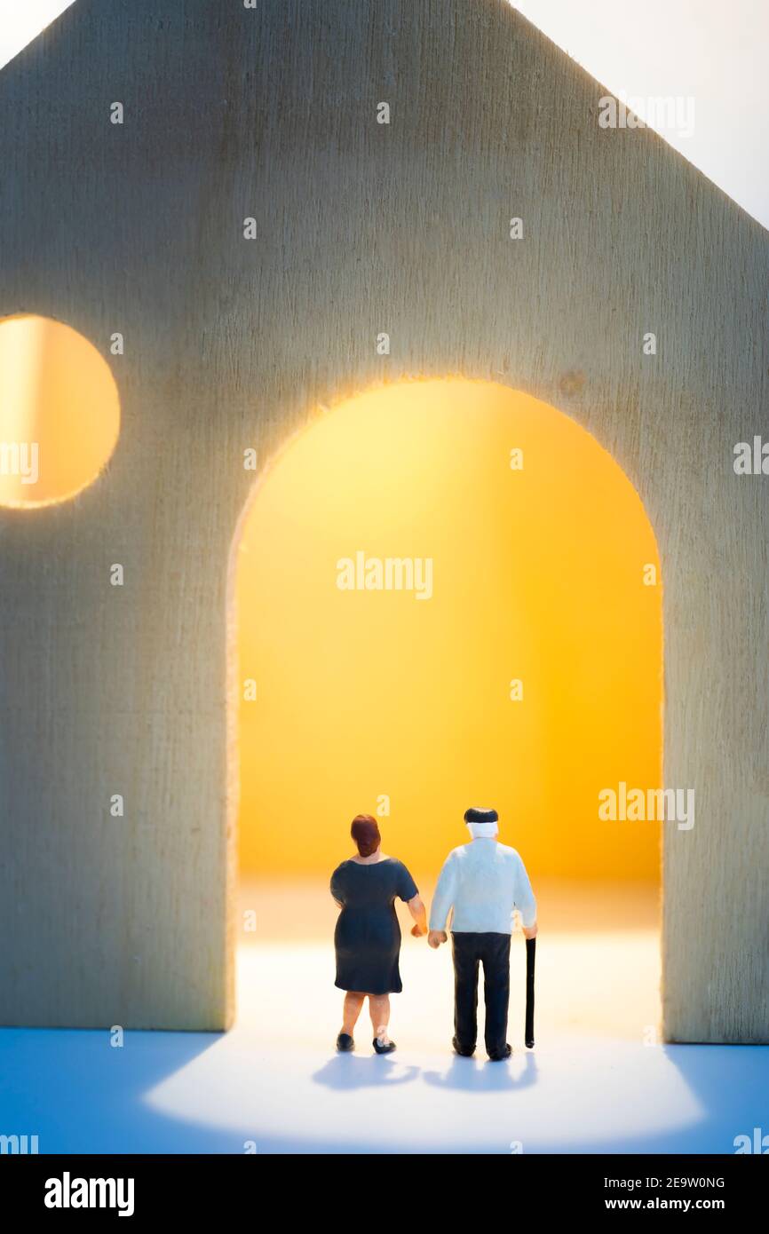 Old couple in warm house concept Stock Photo - Alamy