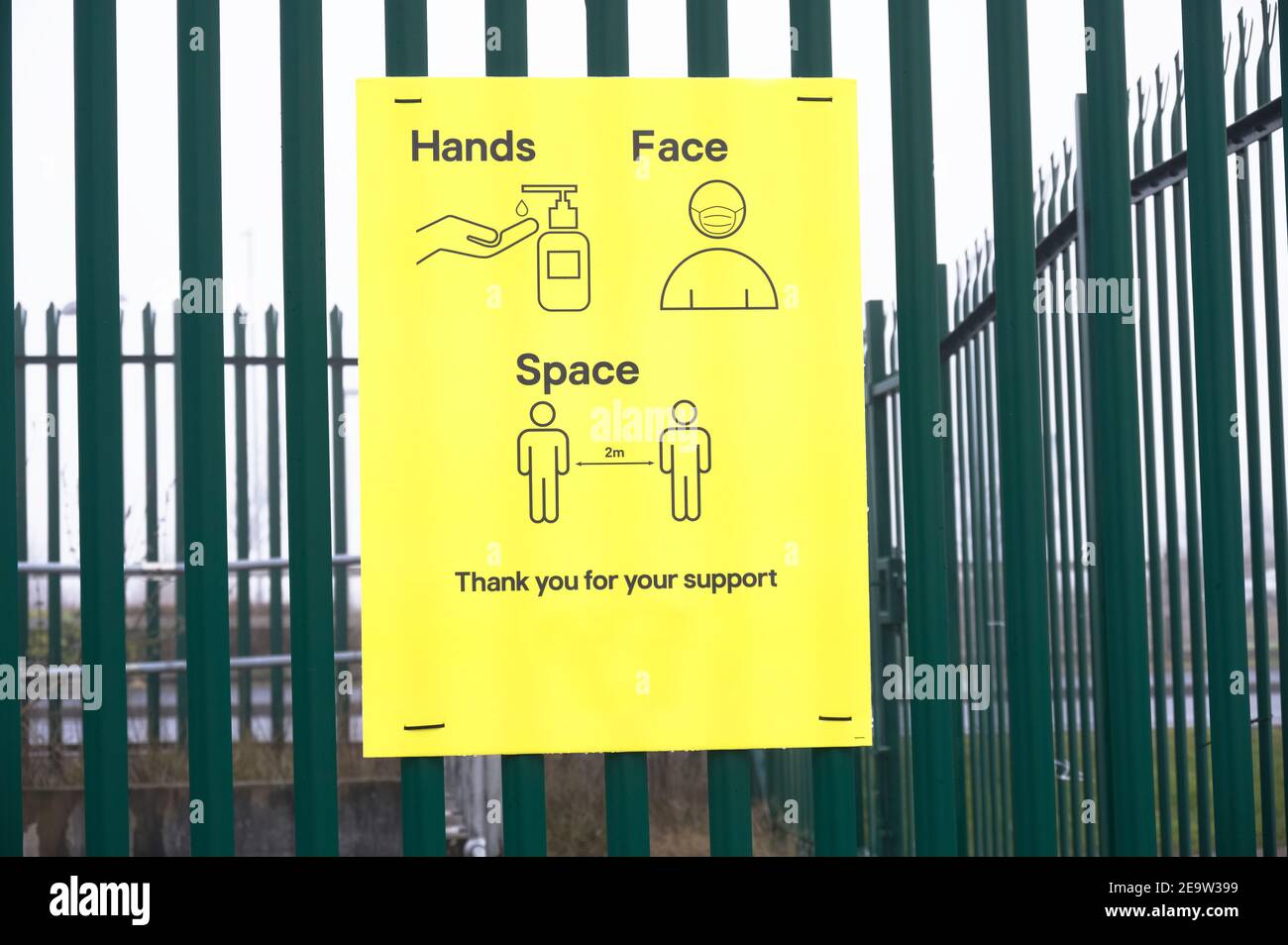 Face covering and wash hands covid sign for shop customers Stock Photo ...