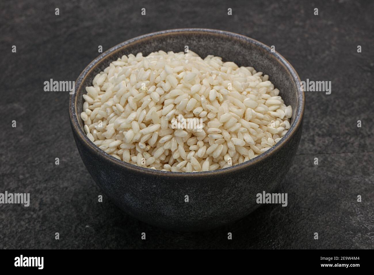 Raw Italian arborio rice for Risotto Stock Photo - Alamy