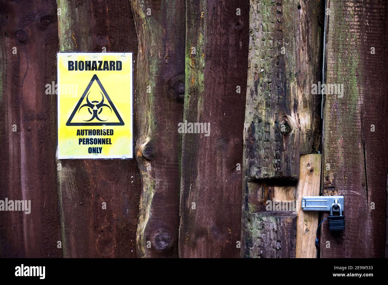Chemical factory biohazard sign danger warning at entrance gate Stock ...