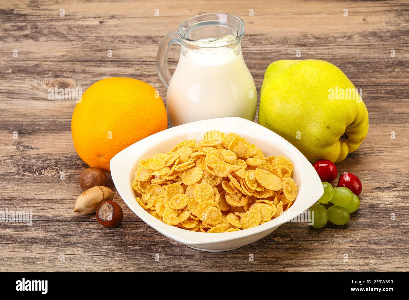 Breakfast with corn flakes, fruits and milk Stock Photo - Alamy
