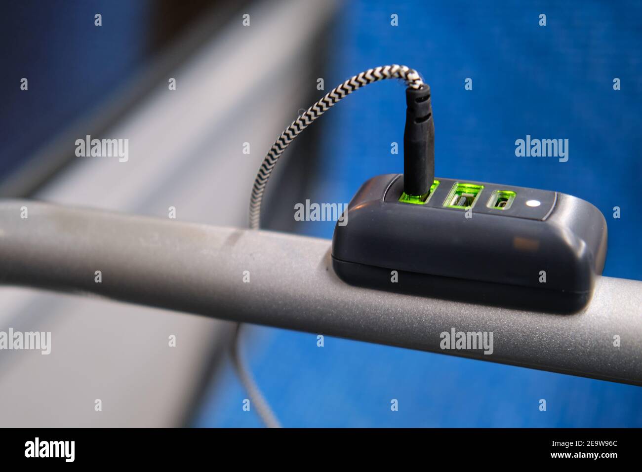 Wire for charging mobile phones in public transport, close-up Stock ...