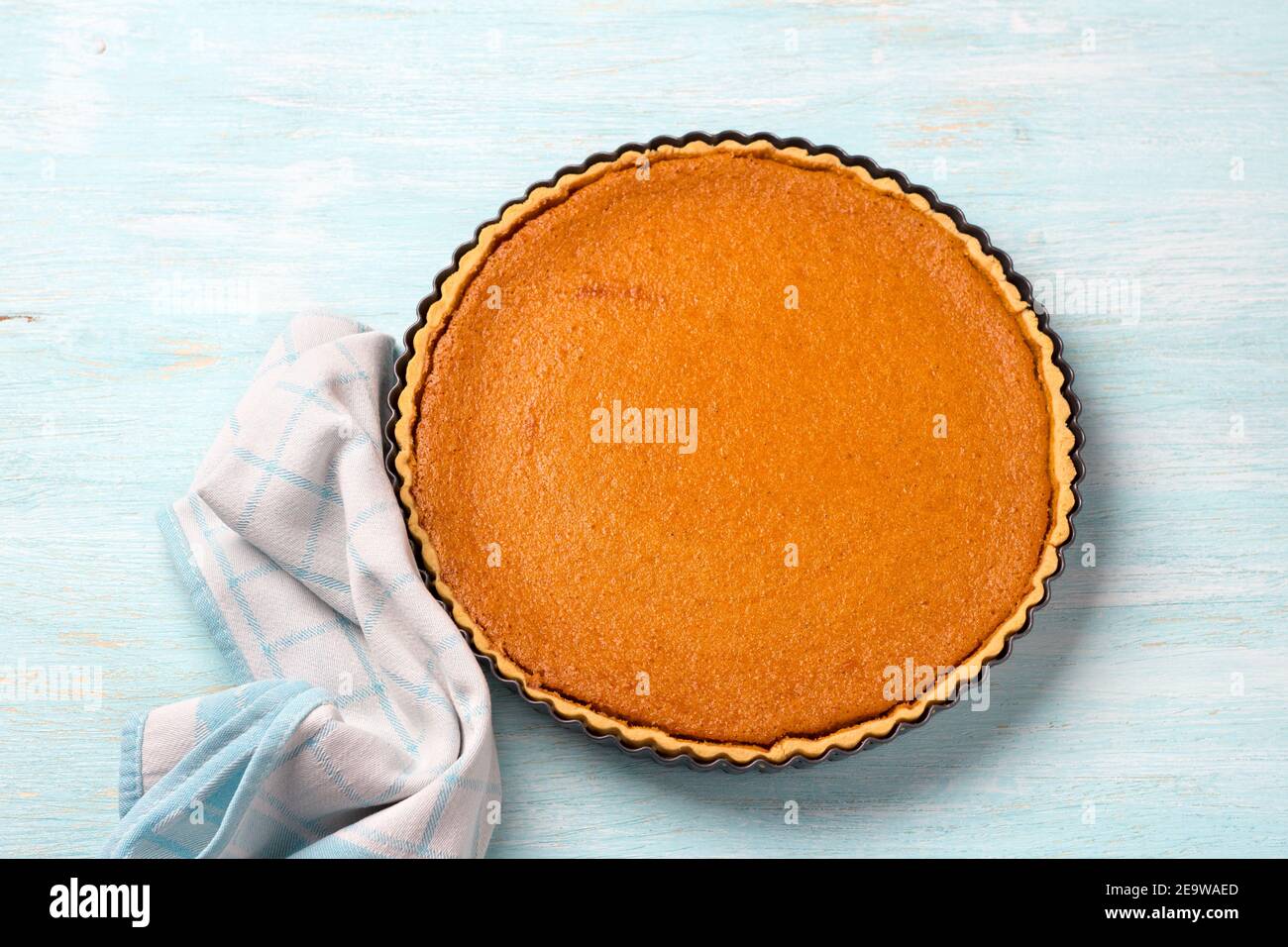 Homemade Pumpkin Pie In The Shape Of A Blue Background Top View Tasty Traditional Food Stock