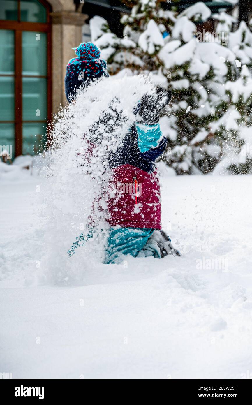 Child throwing snowball hi-res stock photography and images - Alamy