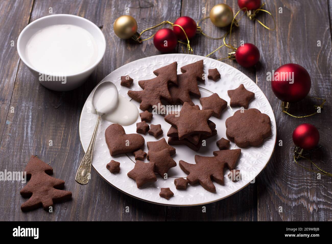 Homemade Christmas chocolate spiced cookies with sugar icing for ...