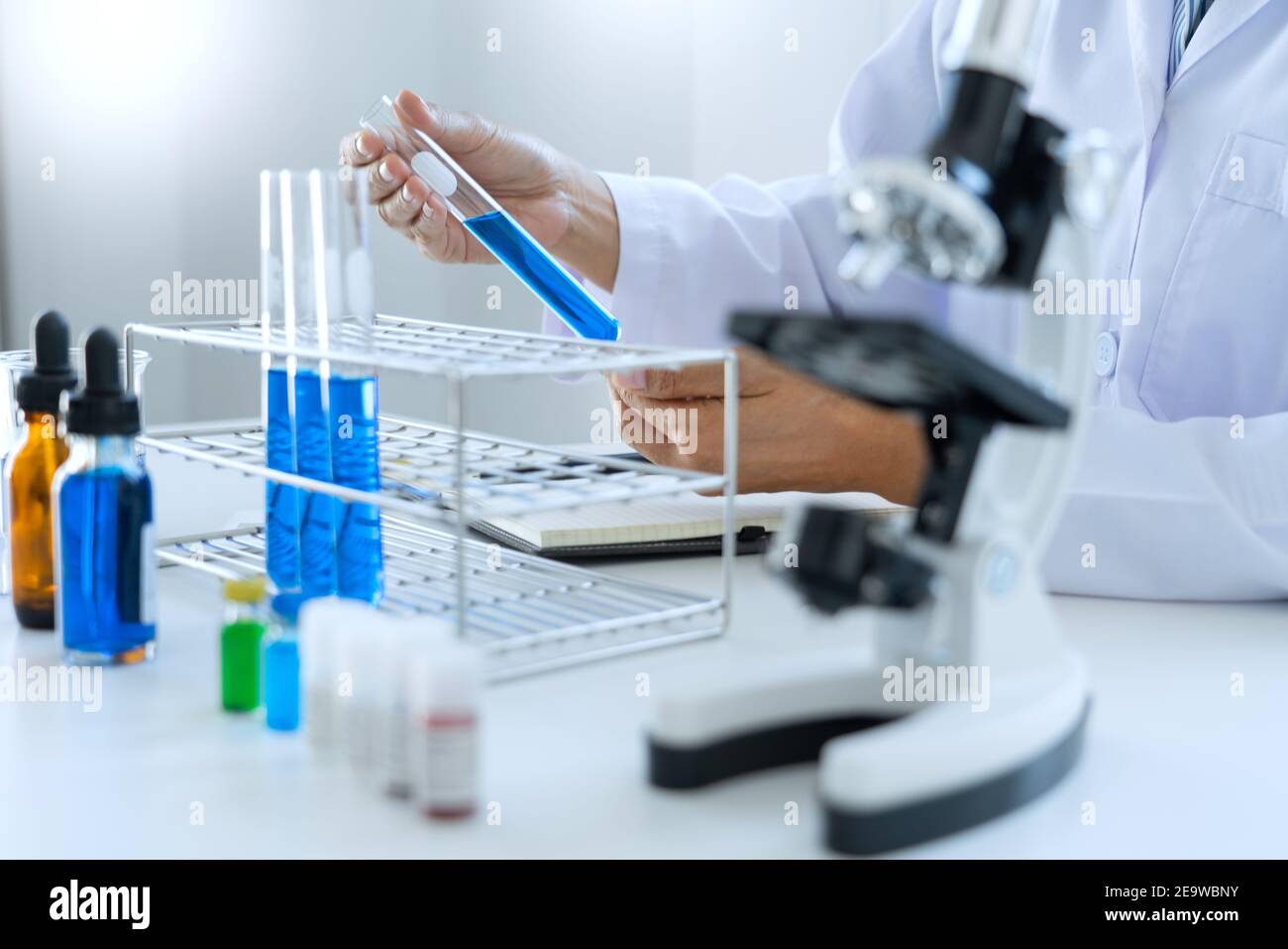 Scientist wear lab coat and protective wear are working with research ...