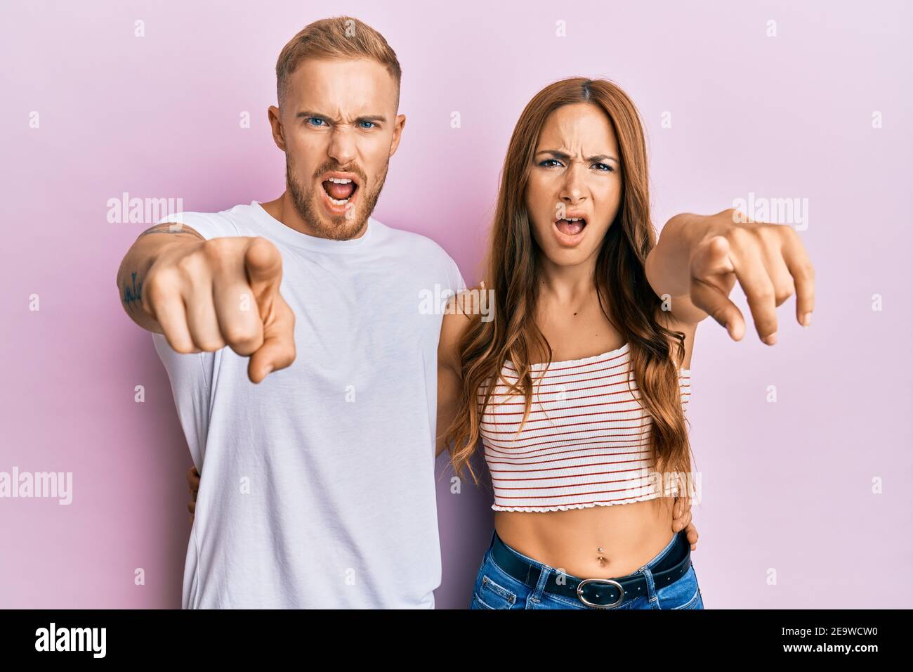 Young couple of girlfriend and boyfriend hugging and standing together ...