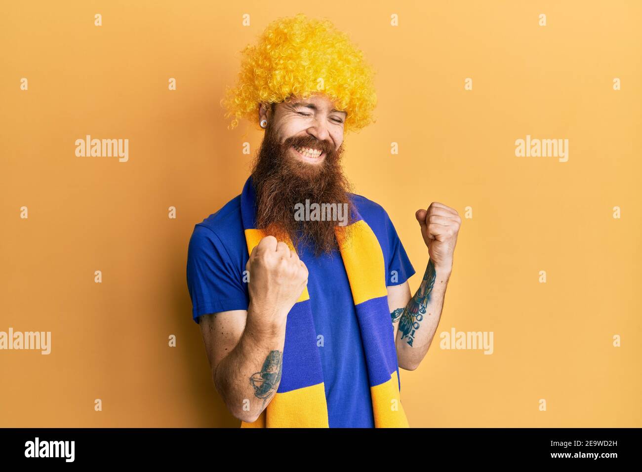 Redhead man with long beard football hooligan cheering game wearing ...