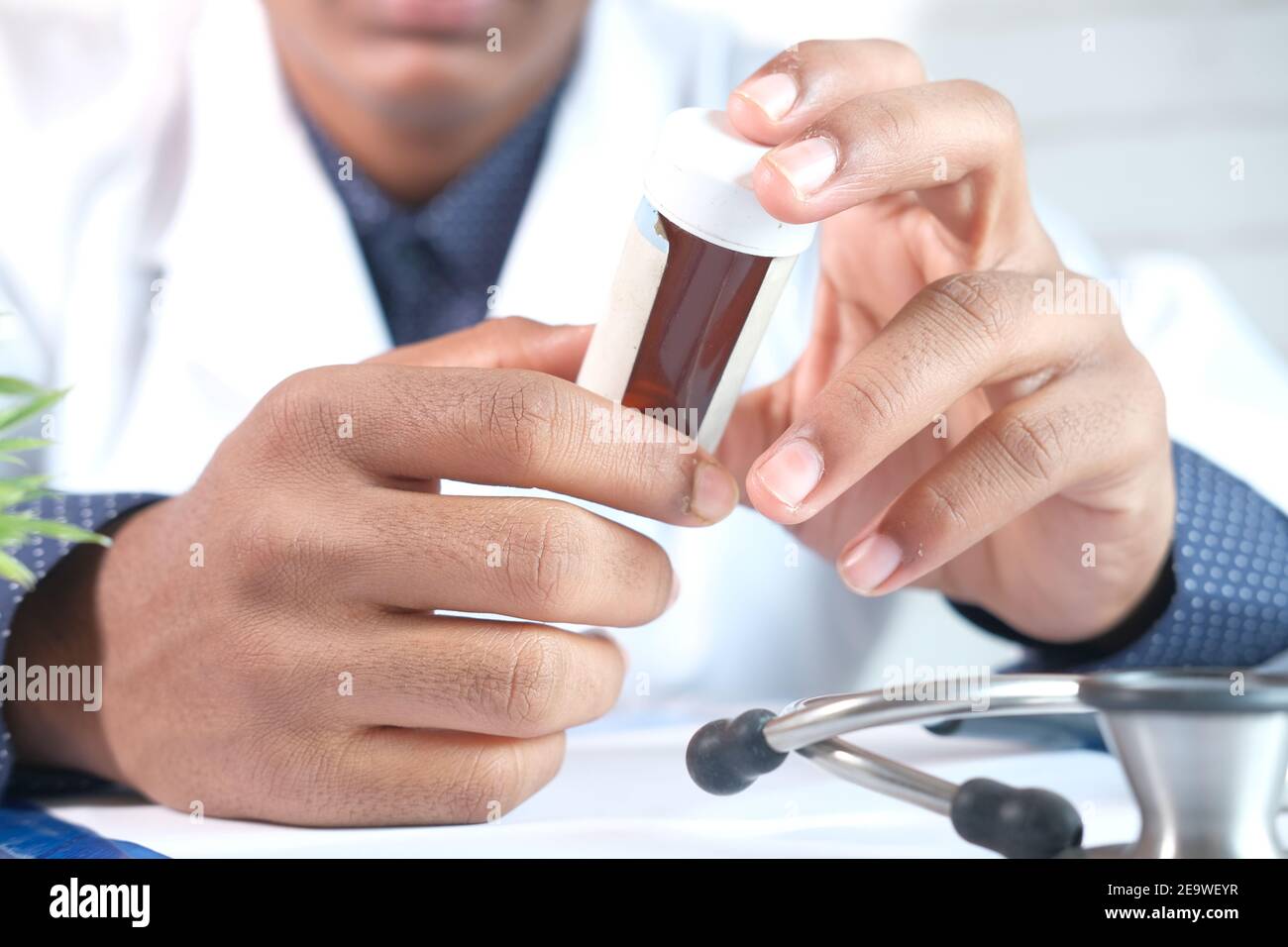 Doctor hand holding pill container hi-res stock photography and images ...
