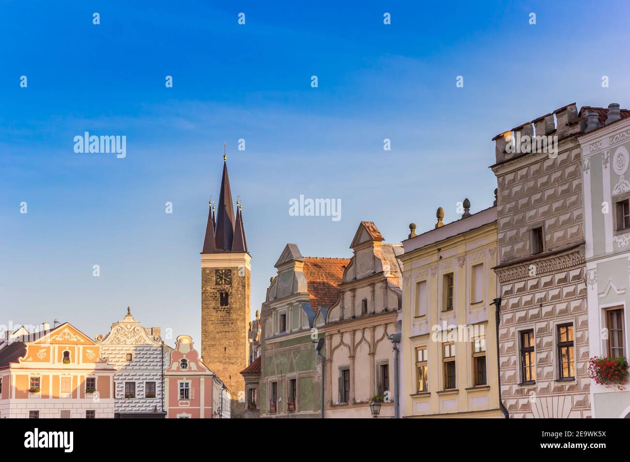 Church tower and old houses at the historic market square of Telc ...