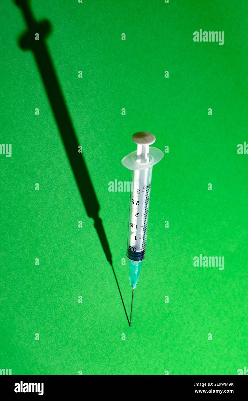 syringe and needle with .shadow Stock Photo - Alamy
