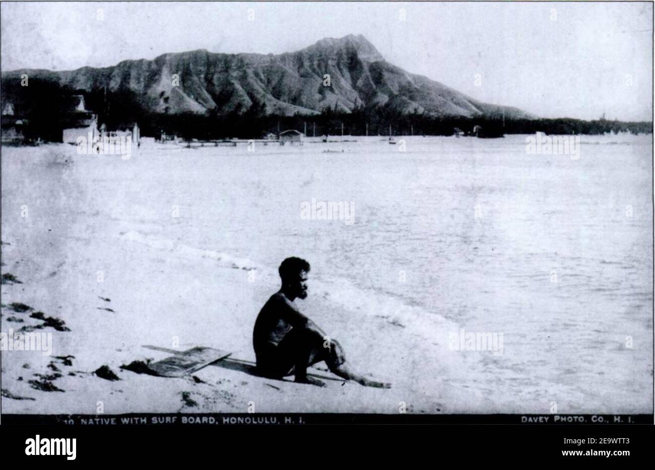 Native Hawaiian surfer seated with alaia board Stock Photo - Alamy