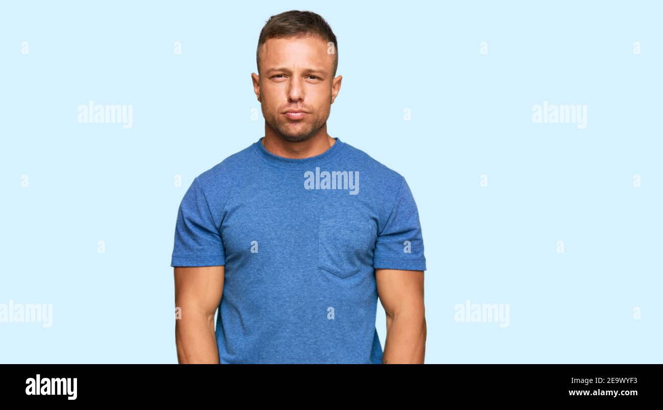 Handsome muscle man wearing casual clothes depressed and worry for ...