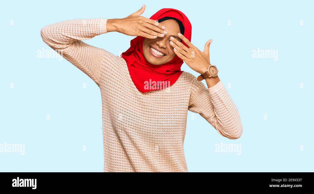 Young african american woman wearing traditional islamic hijab scarf ...