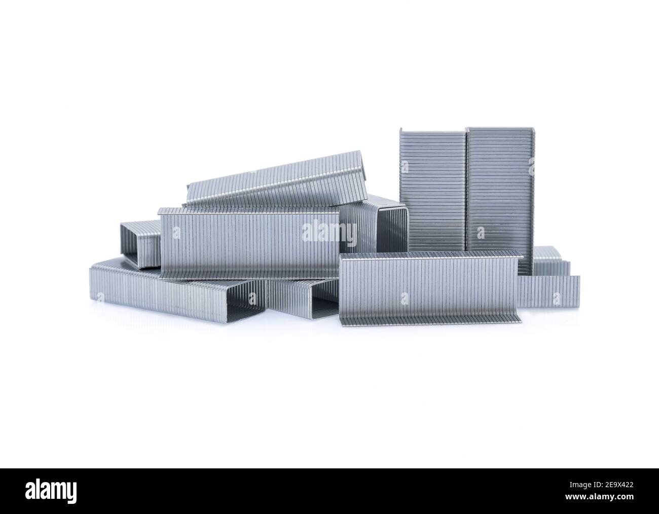 Stack of metal staples isolated on white background Stock Photo - Alamy