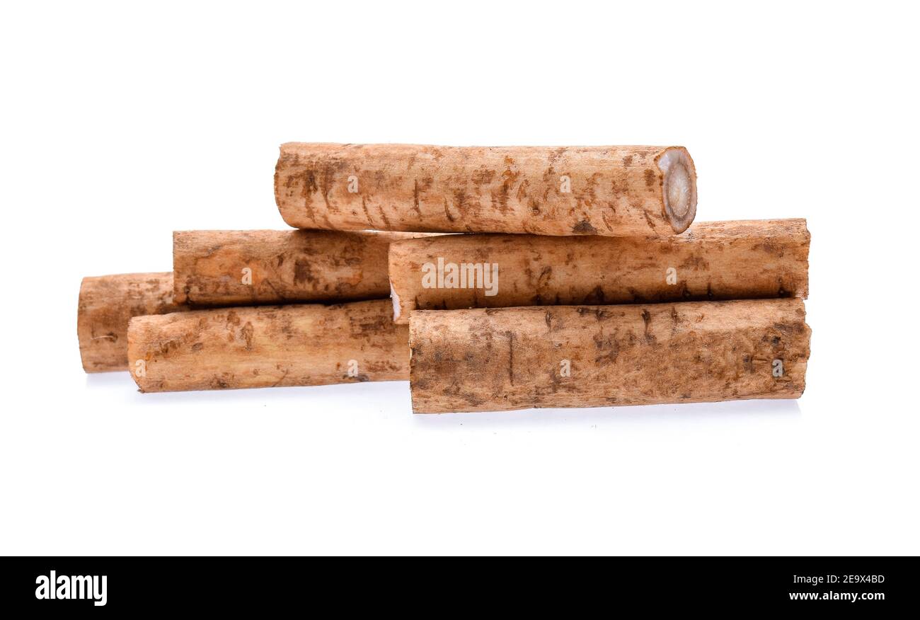 Burdock roots isolated white background Stock Photo - Alamy