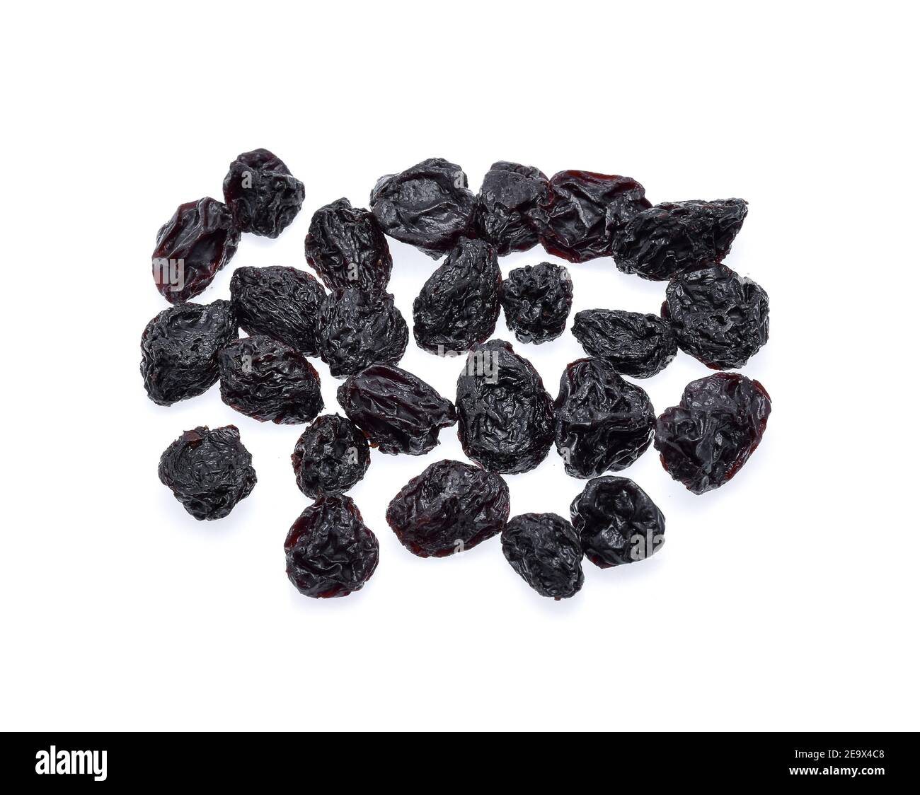 Black raisin isolated on white background Stock Photo - Alamy