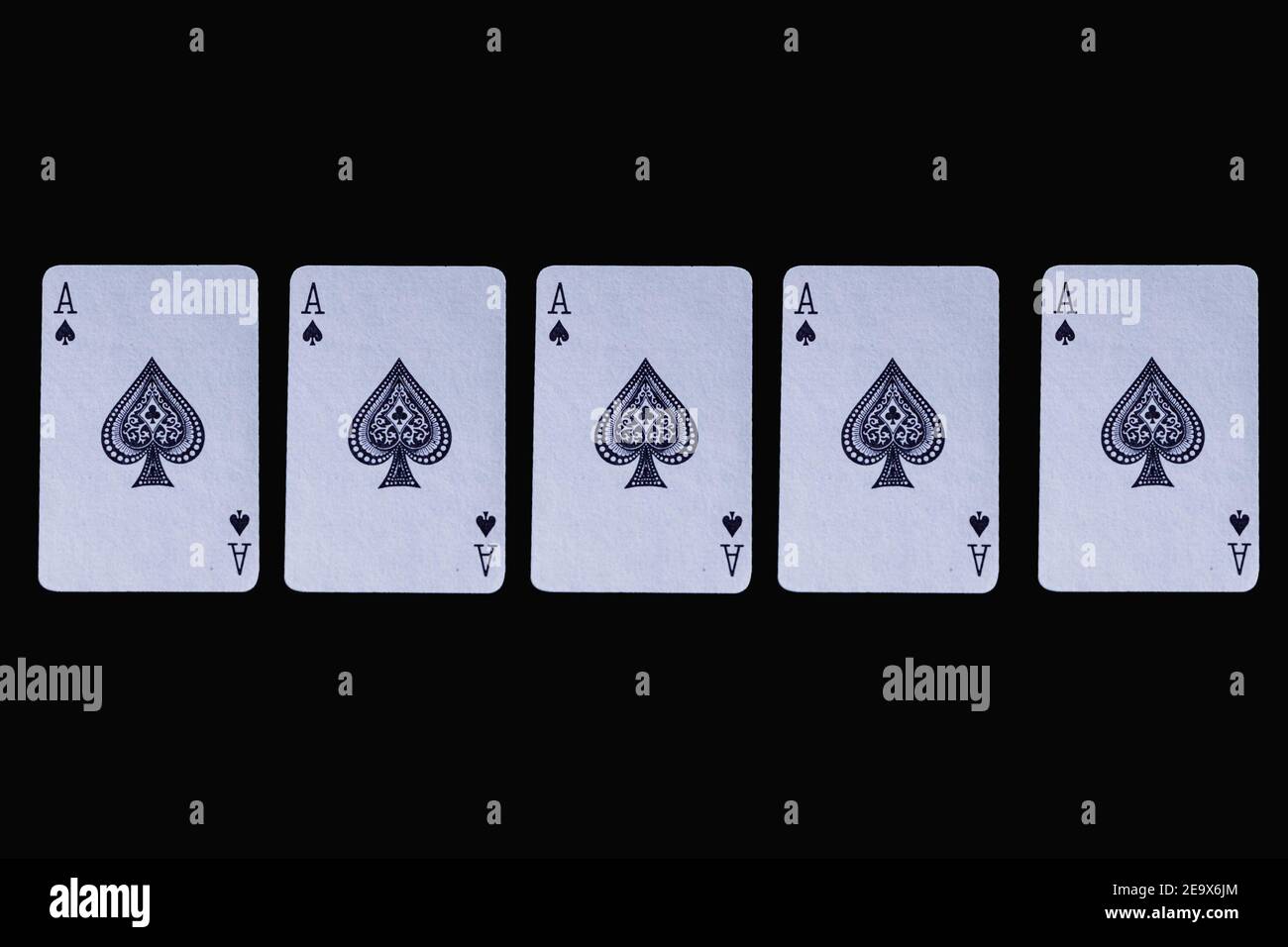 Closeup shot of five ace cards isolated on a black background Stock ...
