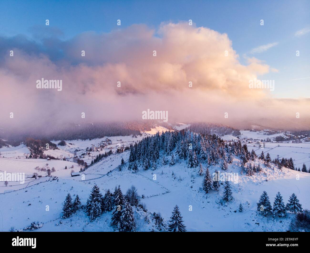 Rolling Clouds At Dense Spruce Coniferous Forest On Snowy White Hill ...