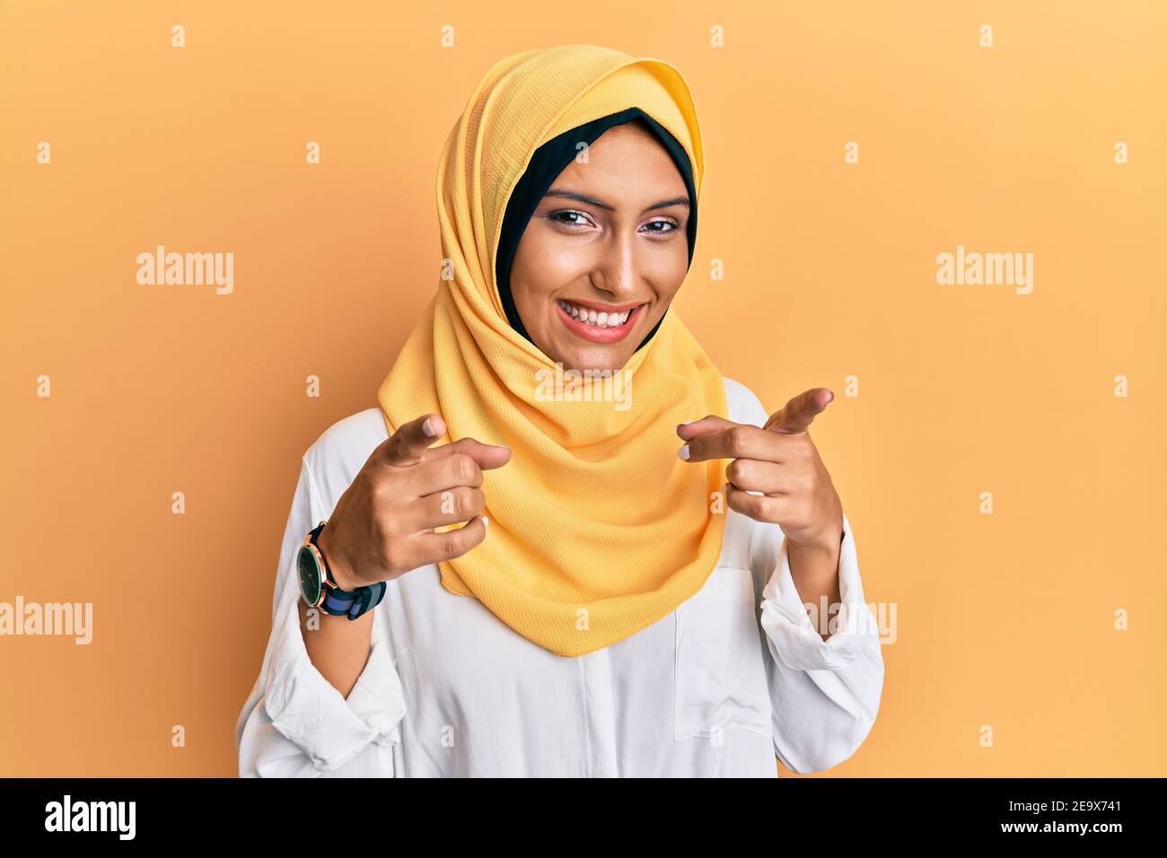 Young brunette arab woman wearing traditional islamic hijab scarf ...
