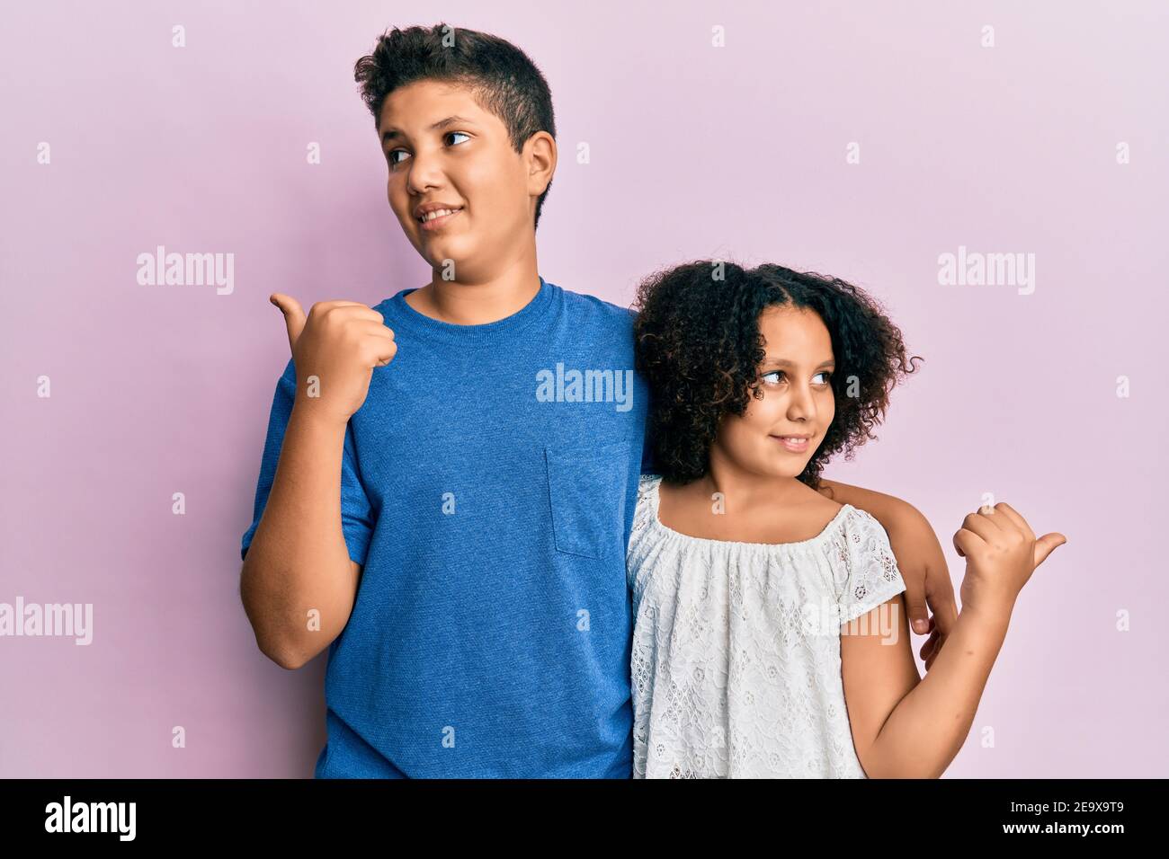 Young hispanic family of brother and sister wearing casual clothes ...