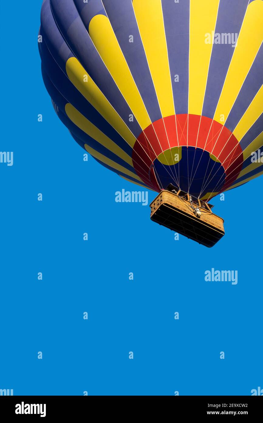 Hot Air Balloon flight in a clear blue sky, bottom up view Stock Photo ...