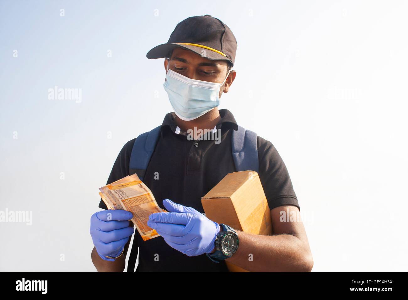 Indian delivery boy hi-res stock photography and images - Alamy