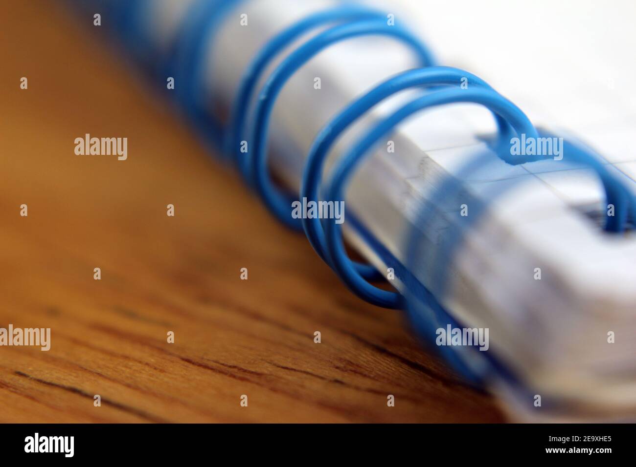 Spiral binder, notebook isolated, foreground, desk background Stock ...