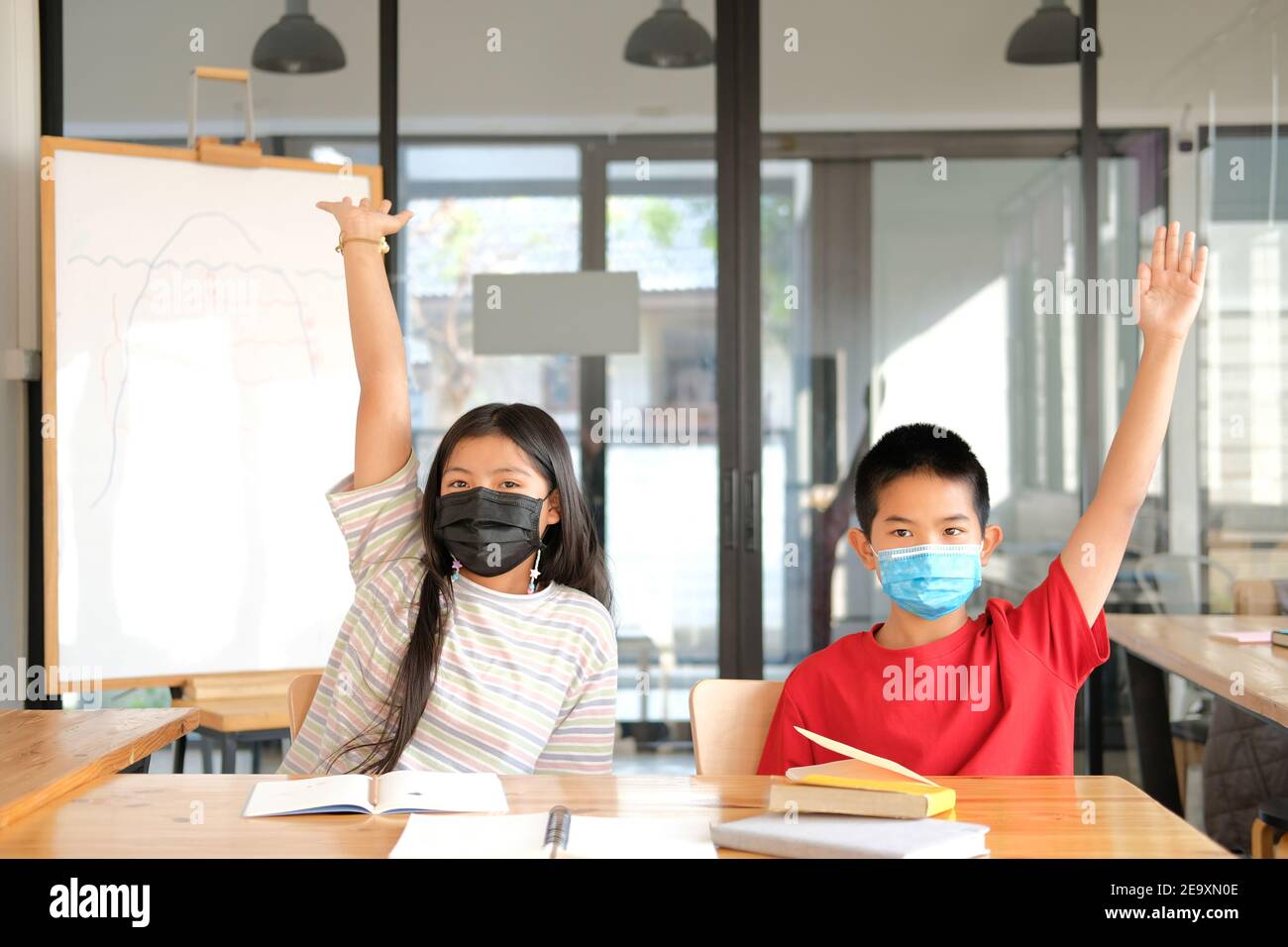 asian girl boy student wearing face mask studying raising hand in ...