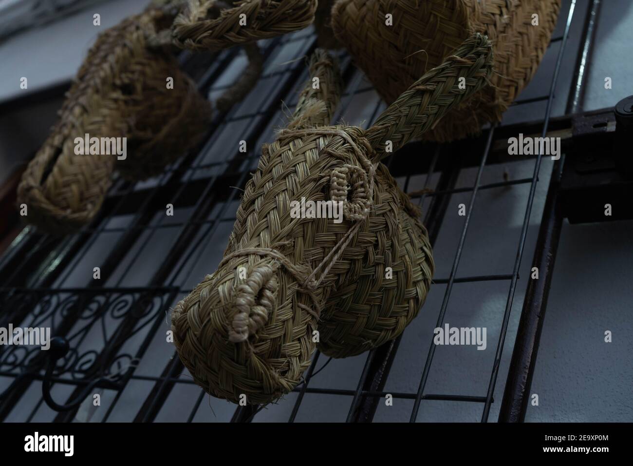 wicker donkey head hanging on the wall Stock Photo - Alamy