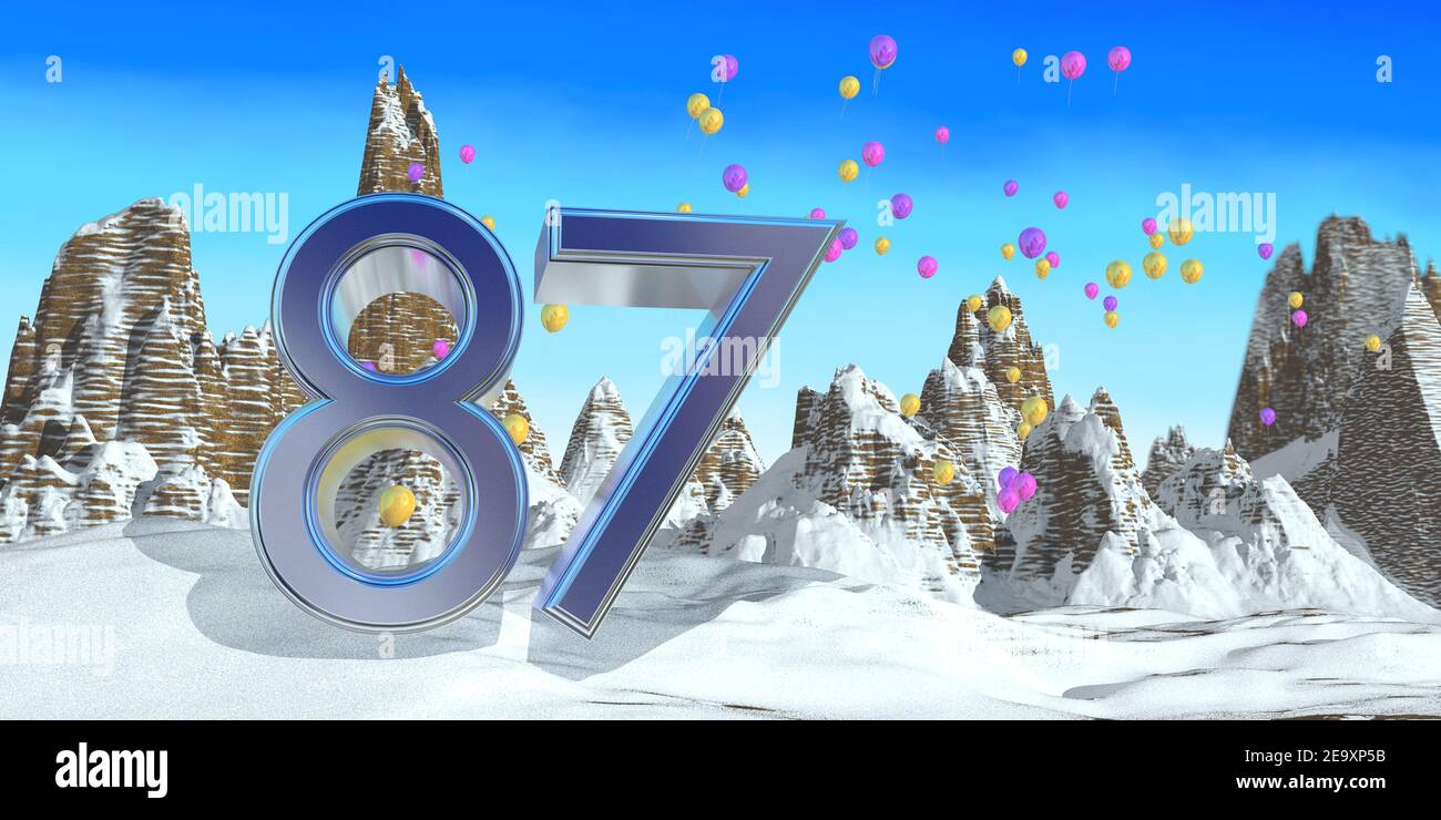 Number 87 in thick blue font on a snowy mountain with rock mountains ...