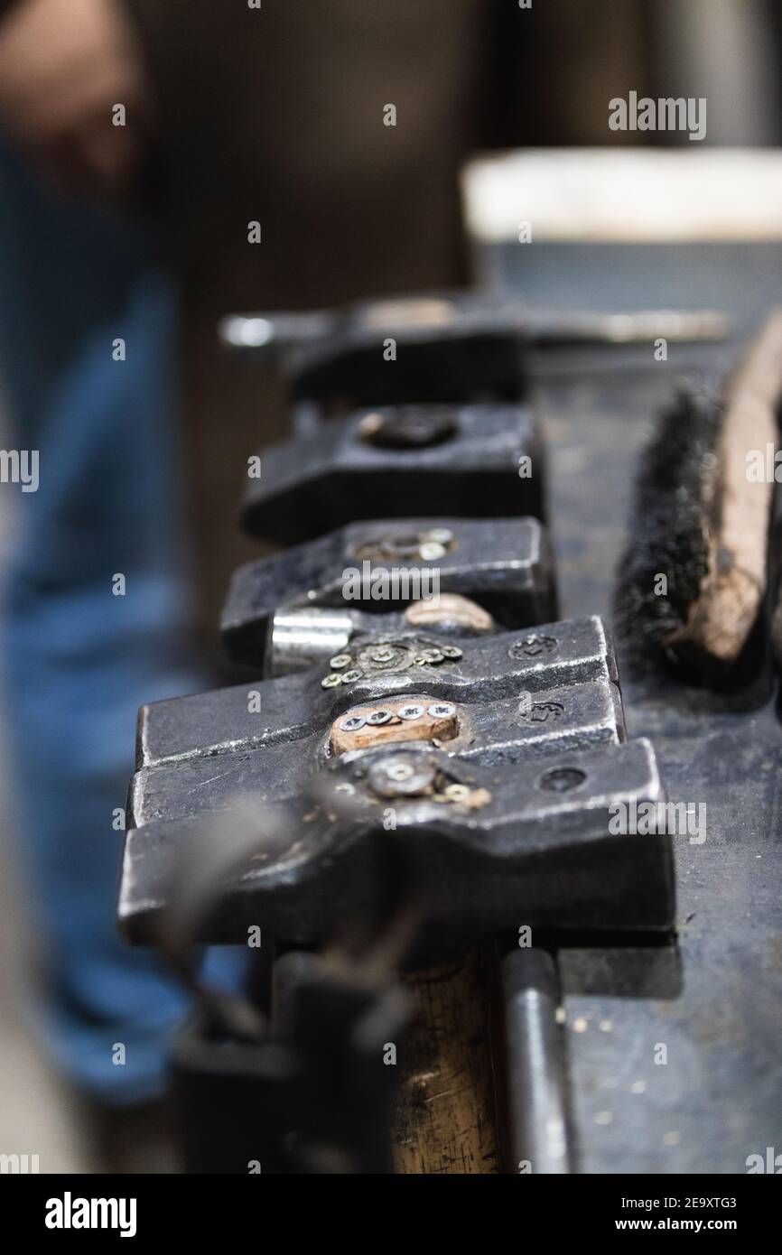 From above of hammers of different shape for repairing metal detail in ...