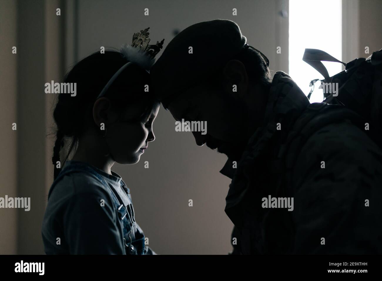 Child touch forehead hi-res stock photography and images - Alamy