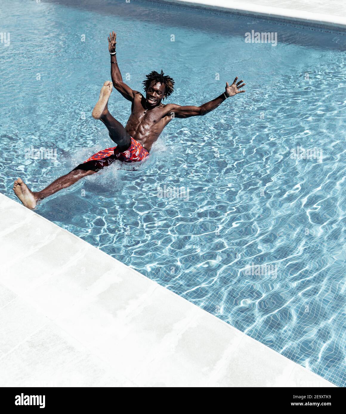 Black man falling into pool hi-res stock photography and images - Alamy