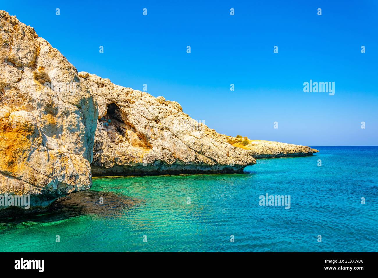 Sea caves at cap greco in the south-eastern cyprus Stock Photo - Alamy