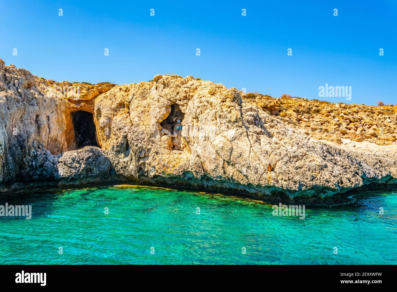 Sea caves at cap greco in the south-eastern cyprus Stock Photo - Alamy