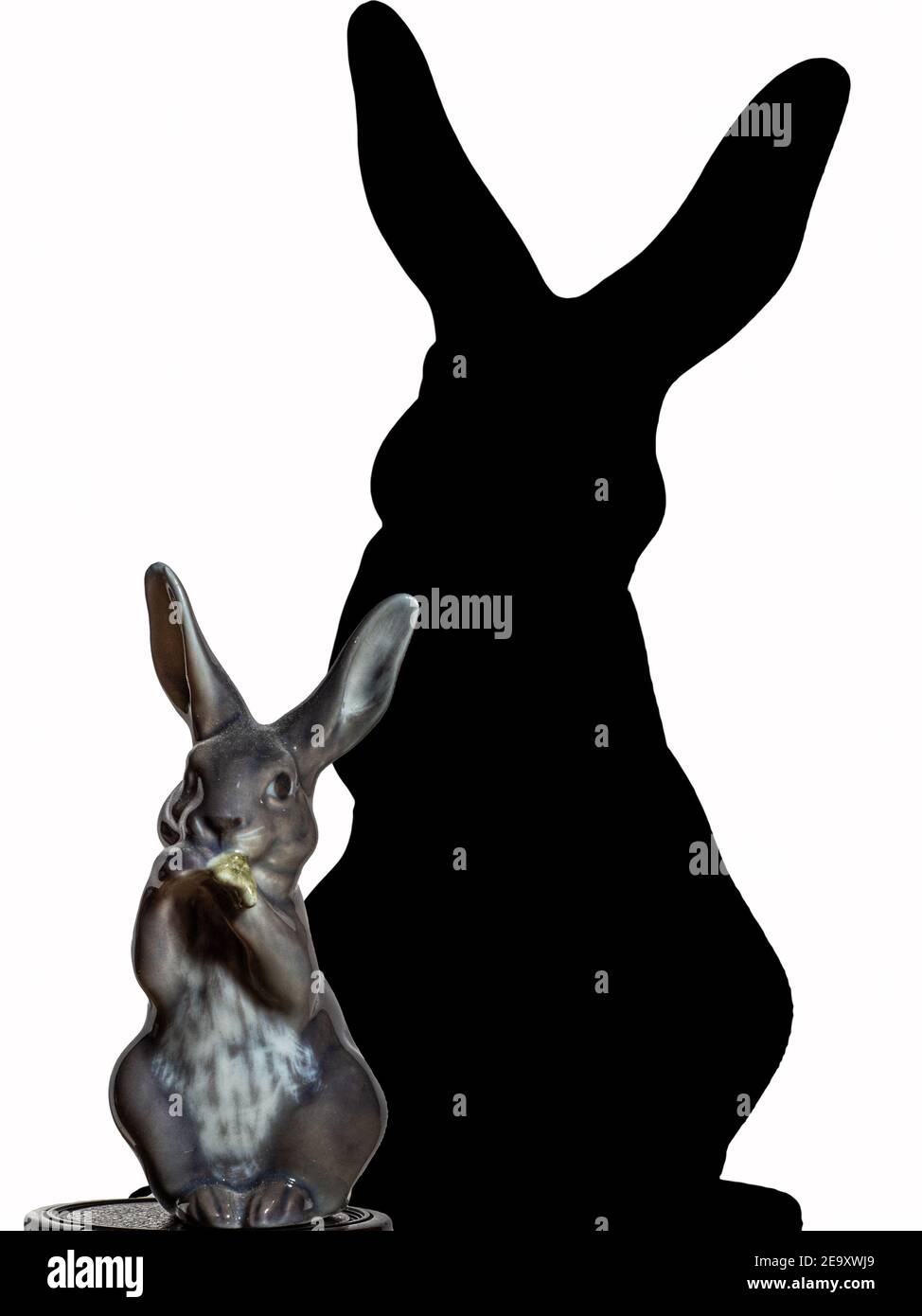 ornamental rabbit with heavy shadow Stock Photo - Alamy