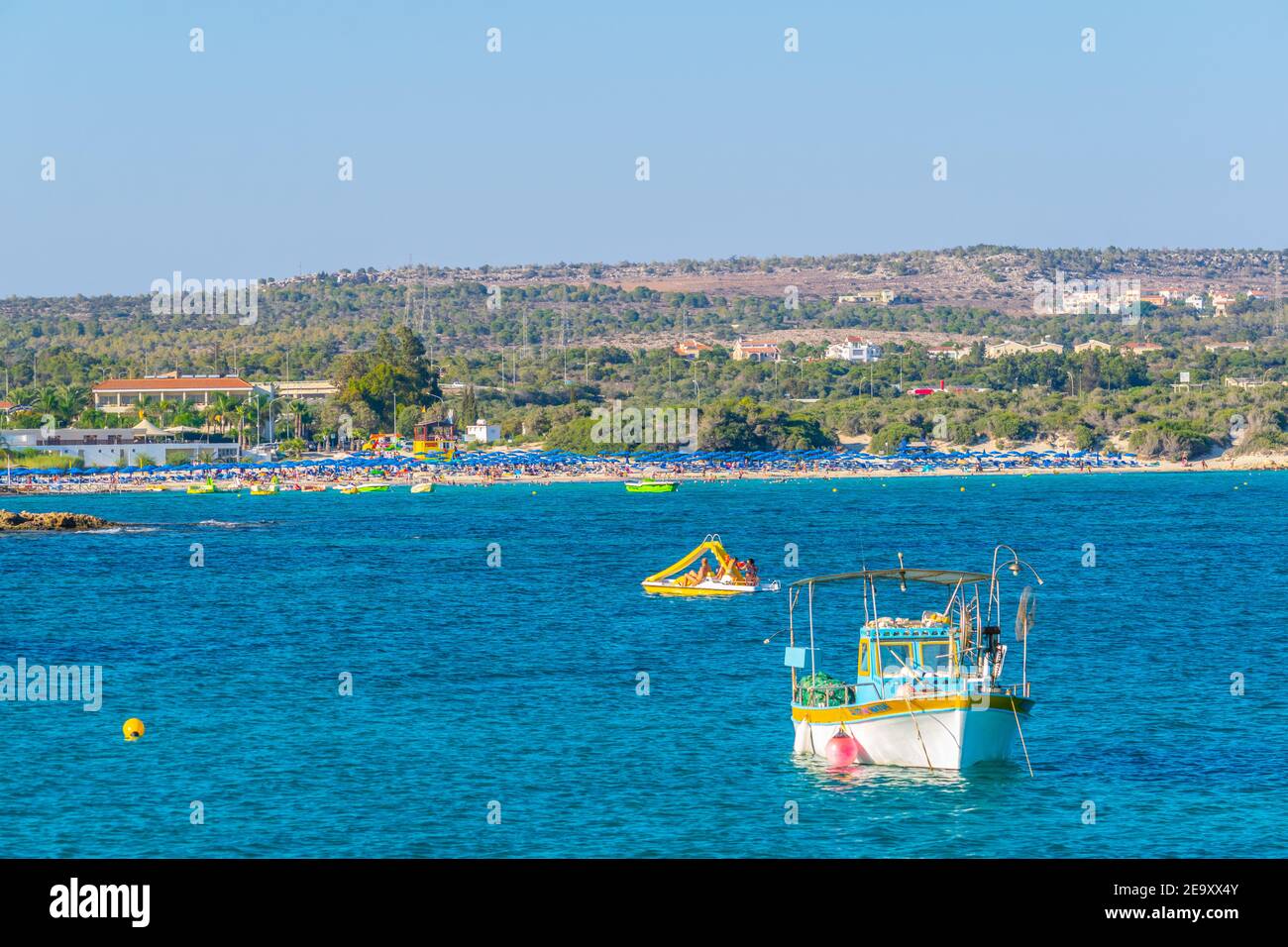 People are enjoying a sunny day at a beach at Agia Napa, Cyprus Stock ...