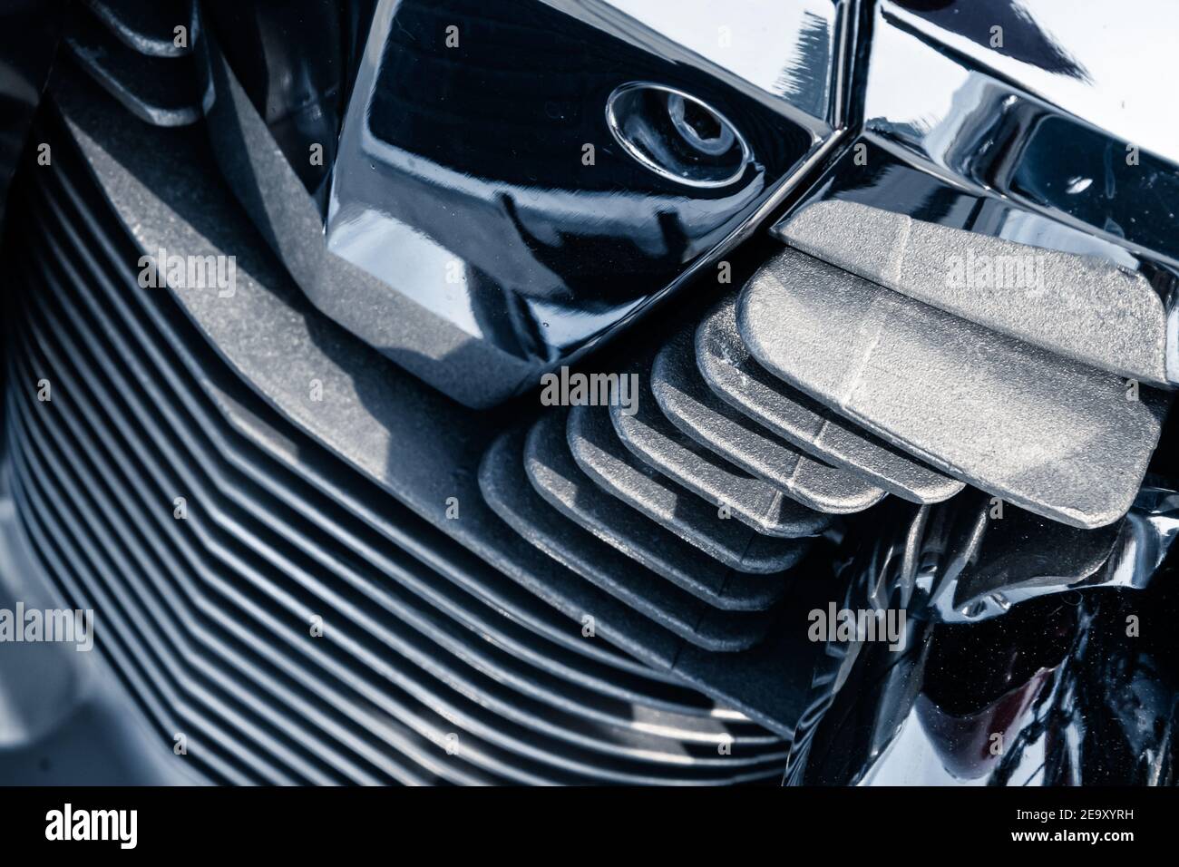Close-up of a powerful motorcycle engine block with chrome-plated parts ...