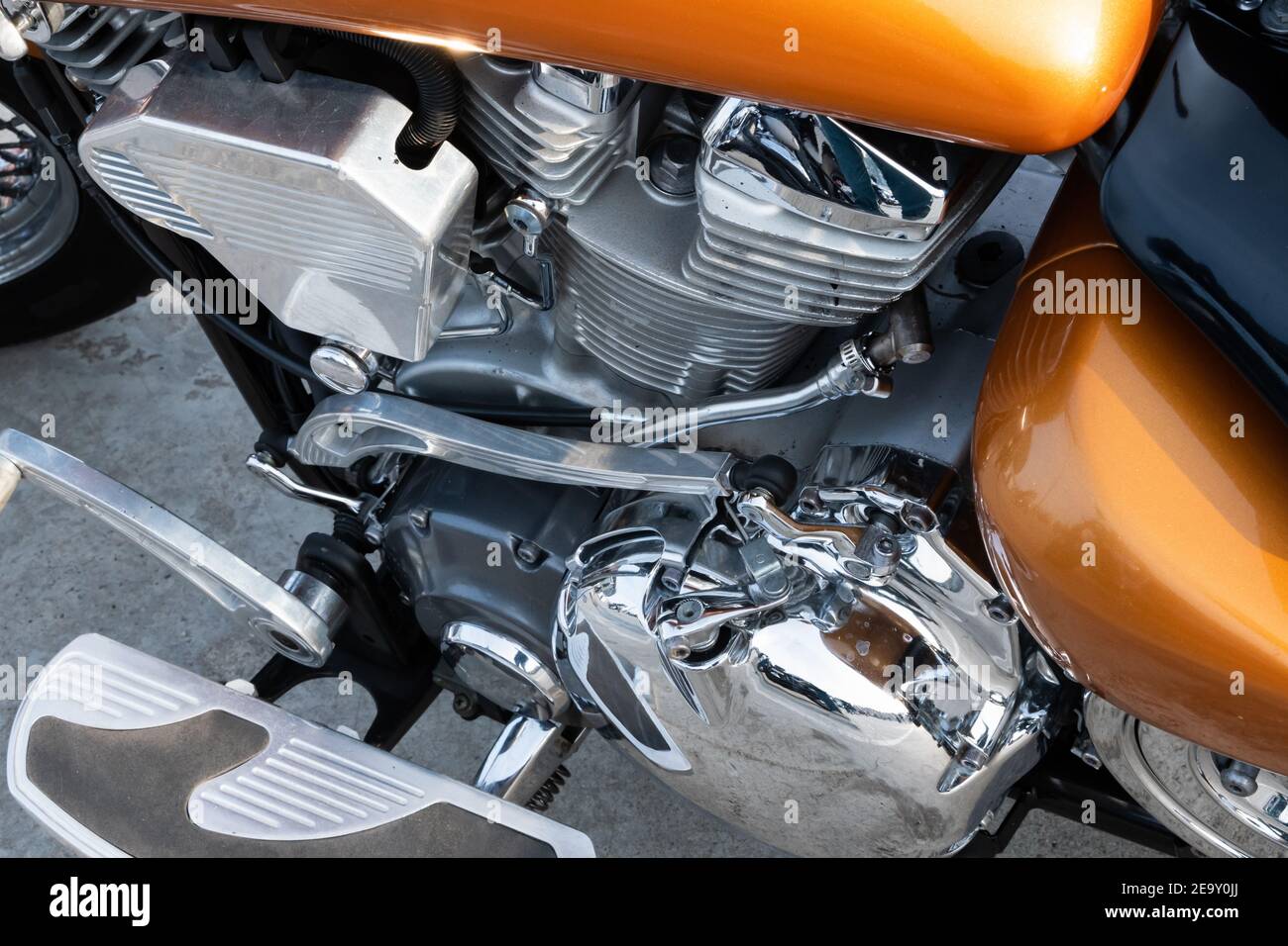 Modern powerful road bike with shiny chrome reflective engine surface ...