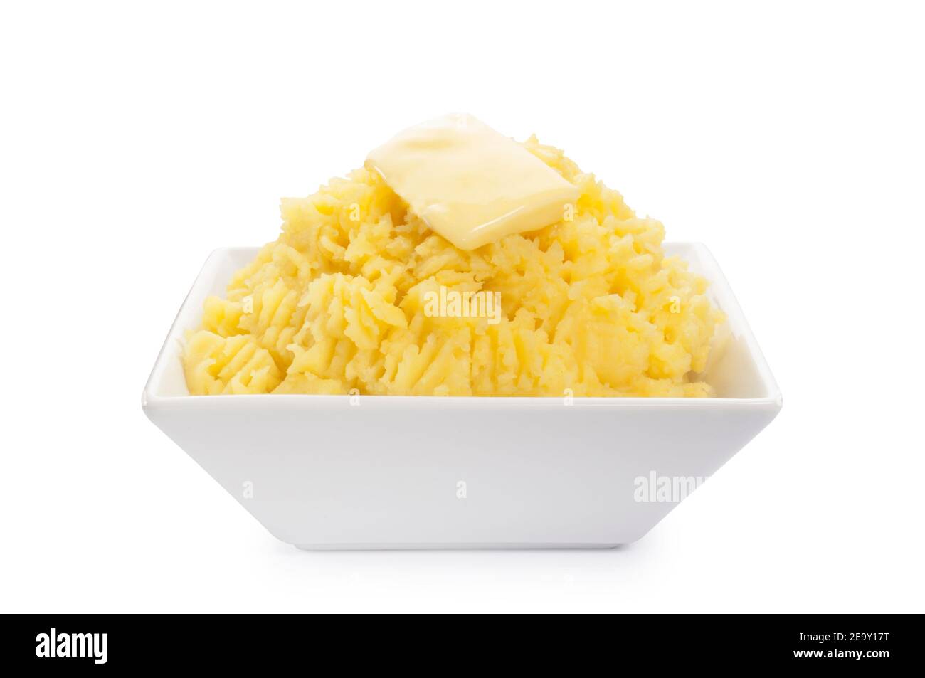 Studio shot of buttery mashed potato cut out against a white background ...